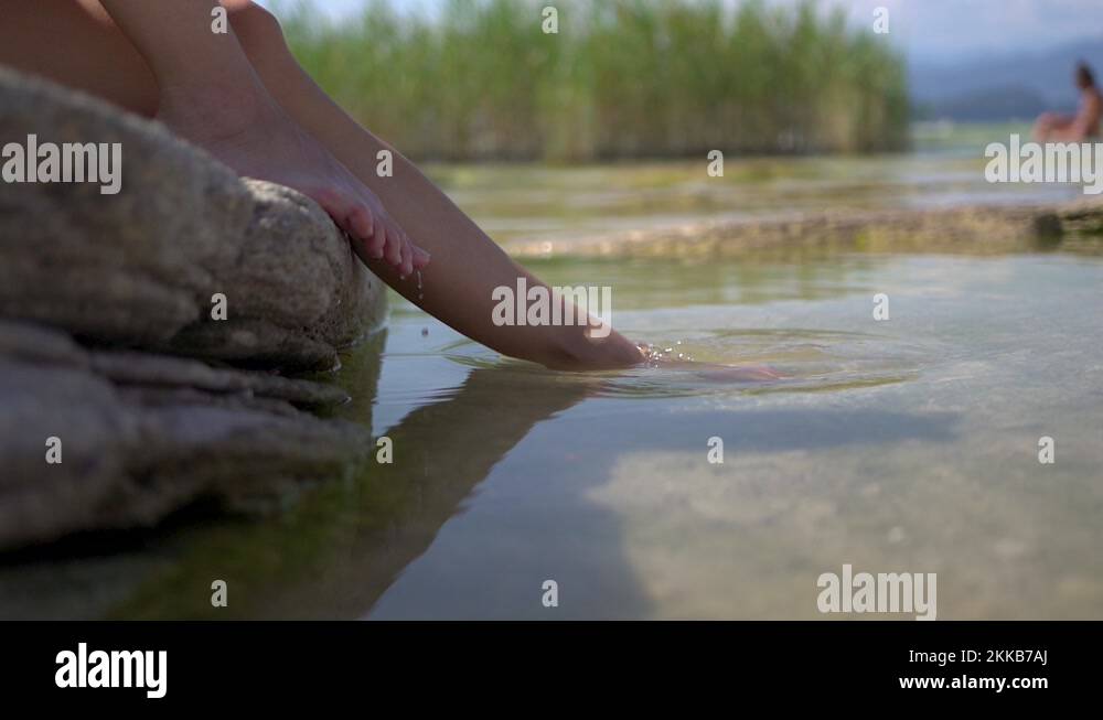 Woman dipping foot in sea Stock Videos & Footage - HD and 4K Video ...