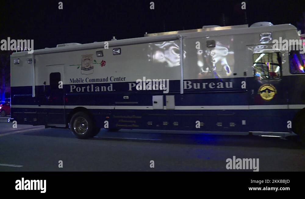 PORTLAND POLICE BUREAU MOBILE COMMAND CENTER VAN DRIVING AT NIGHT Stock ...