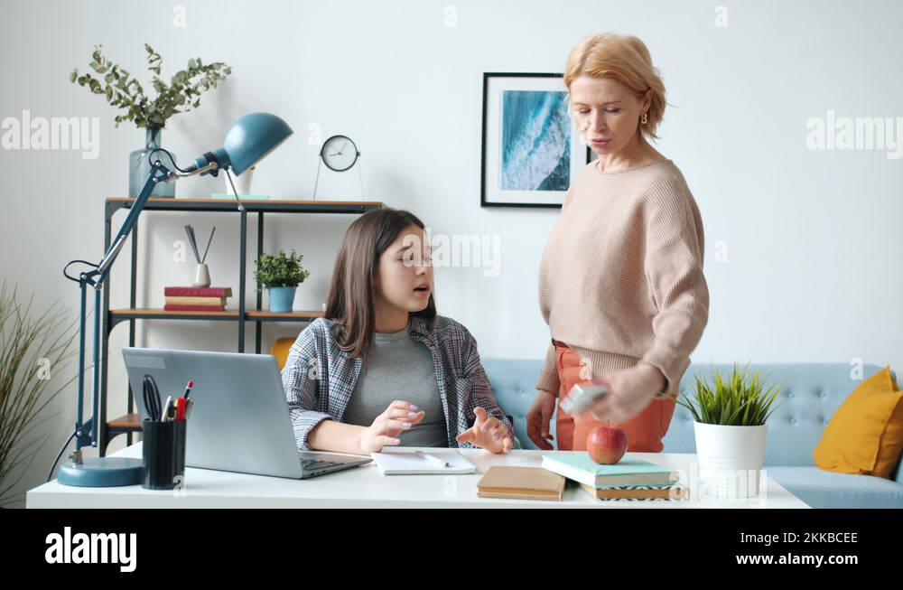 Teen girl playing video game instead of doing homework then fighting ...