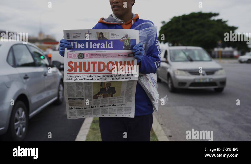 Newspaper Vendor on busy Cape Road, selling newspapers three days ...