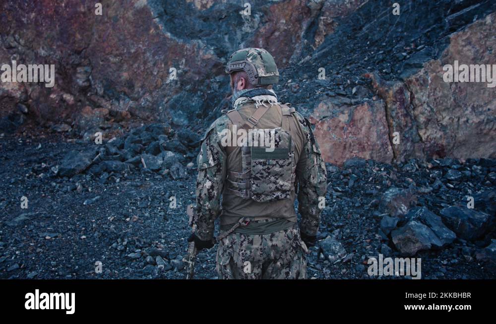 Special force soldier stands after hard battlefield in the mauntain ...