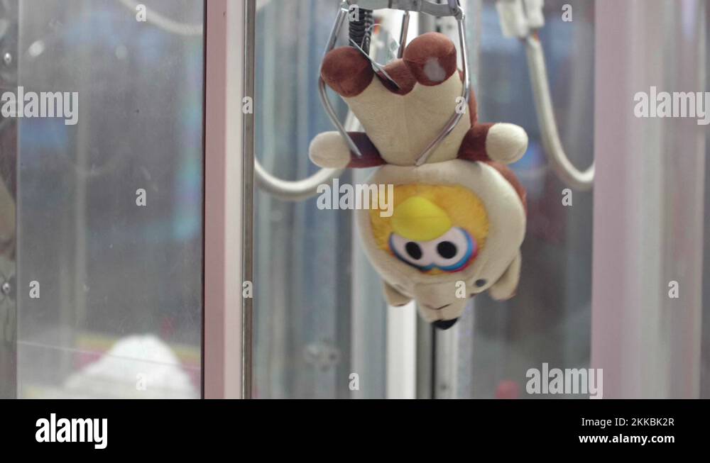 Claw in Claw Machine Picked Up the Doll, But Fail to Hold it, The Doll ...