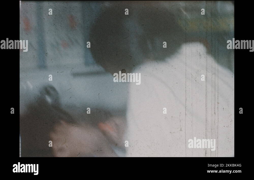 1960s: Shots of reflection in mirror, woman setting woman's hair in kitchen Stock Video Footage ...