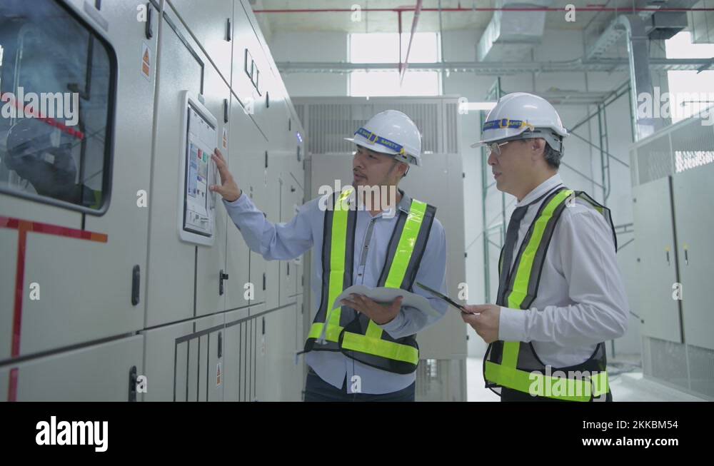 Engineer concept of 4k Resolution. The employee is checking the ...