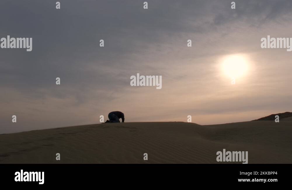 Man praying in desert Stock Videos & Footage - HD and 4K Video Clips ...