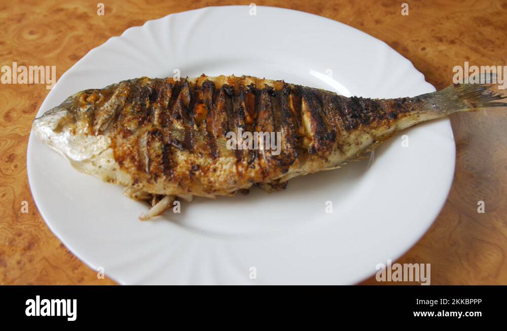 Fish on plate Stock Videos & Footage - HD and 4K Video Clips - Alamy