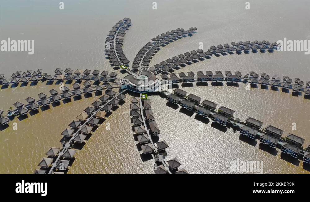Aerial view Of Palm Tree Layout Of Huts Standing On The Ocean Water ...