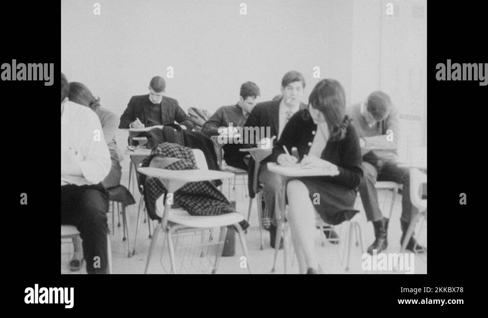 1960s: student smoking cigarette while taking test then getting up and ...
