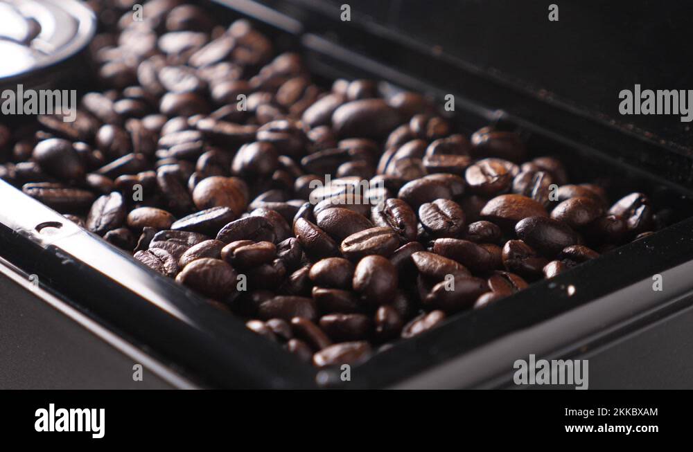Coffee beans shaking in coffee machine. Making process Stock Video ...