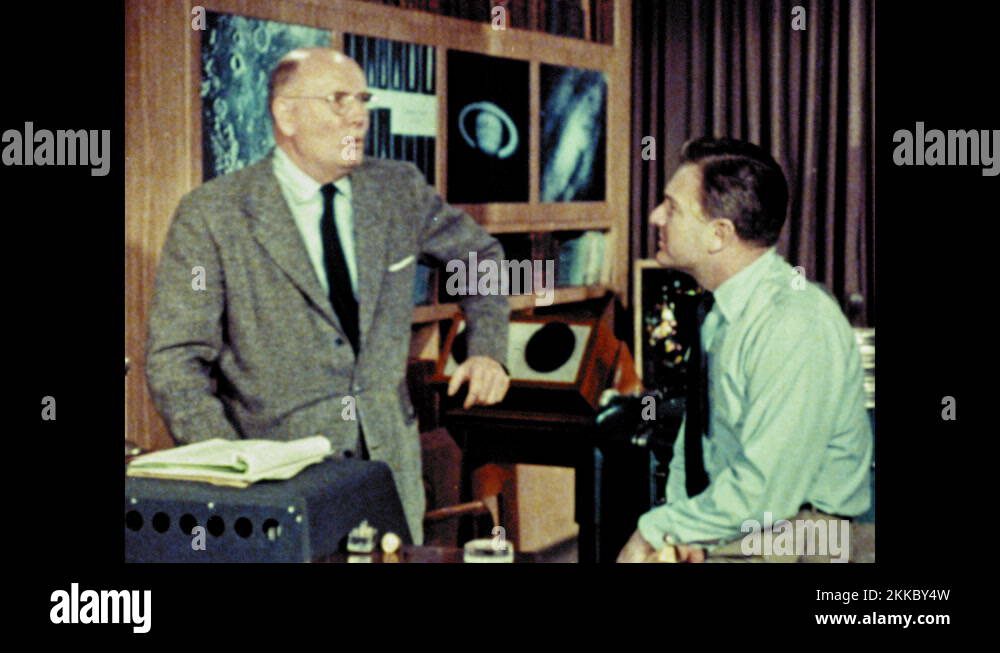 1950s: Men speak to animated sun and old man. Sun fills screen Stock ...