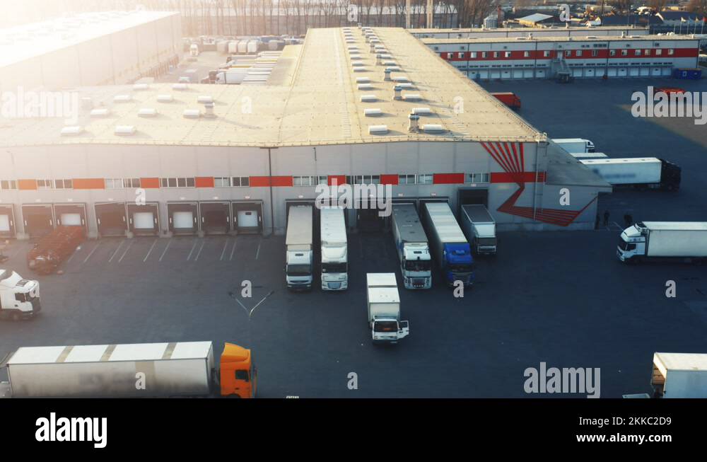 Logistics park with a loading hub. A lot of semi-trailer trucks stand ...