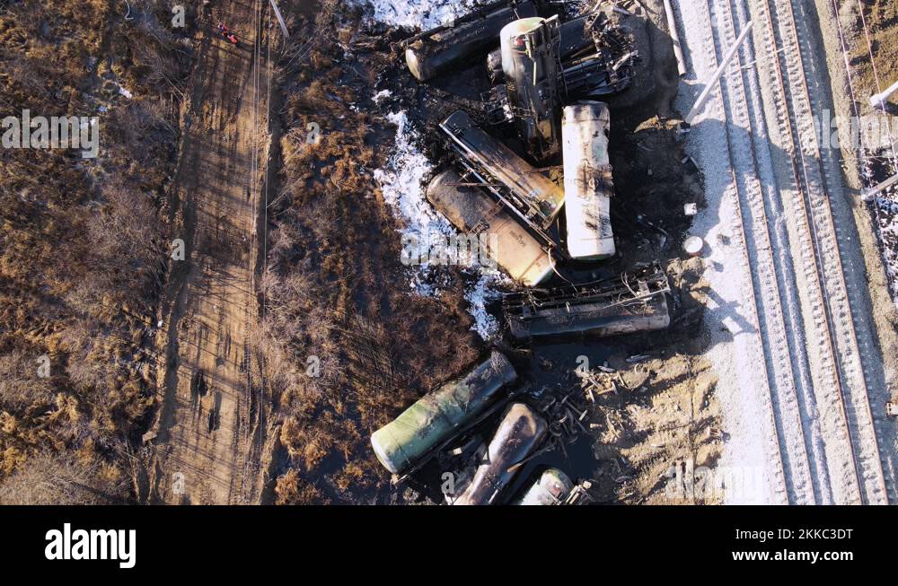 A train wreck on the railroad, scattered tanks, a tractor rides Stock ...