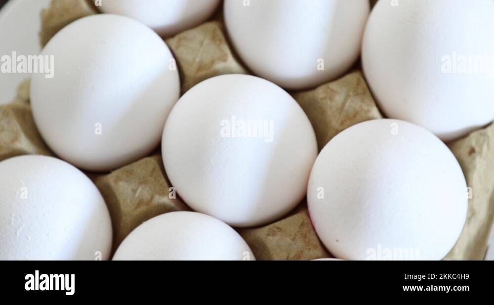 Eggs rotating at black background 4 Stock Video Footage - Alamy