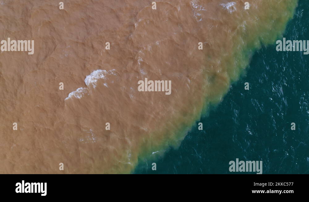 Wastewater discharging from the factory into the Ocean. Sea Pollution ...