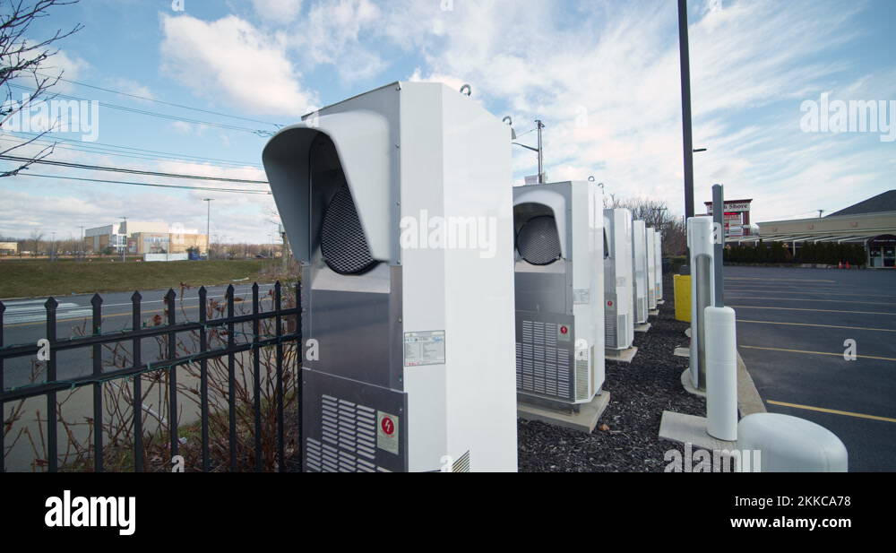 Tesla Electric Car, Supercharger Charging Station. Power Units Stock ...