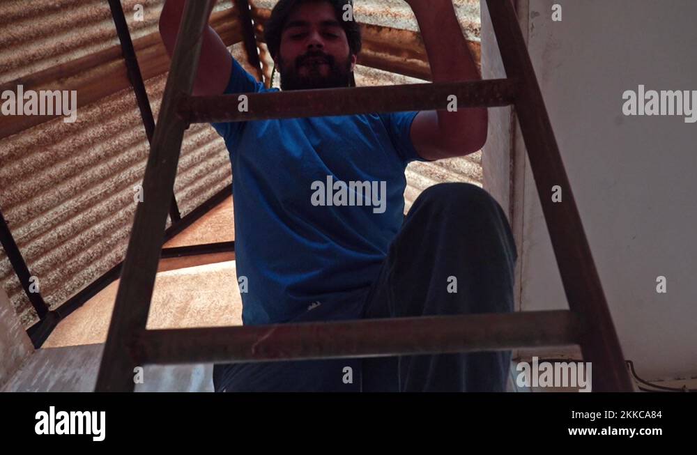 Man climbing steel ladder Stock Videos & Footage - HD and 4K Video ...