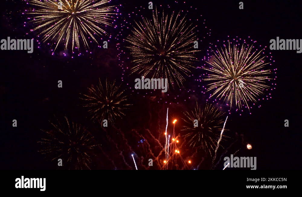 Multiple fireworks burst in multiple colors in the night sky Stock ...