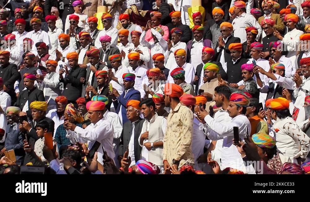 people crowd stands up to welcome the arrival of their new king, crowd ...