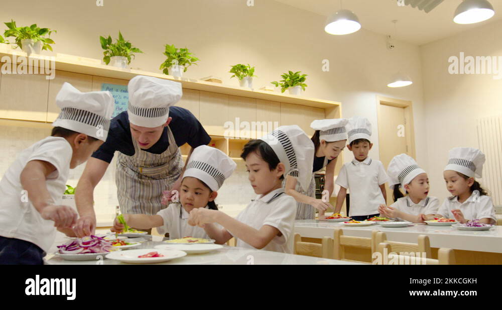 Children learning cooking in kindergarten classroom,4K Stock Video ...