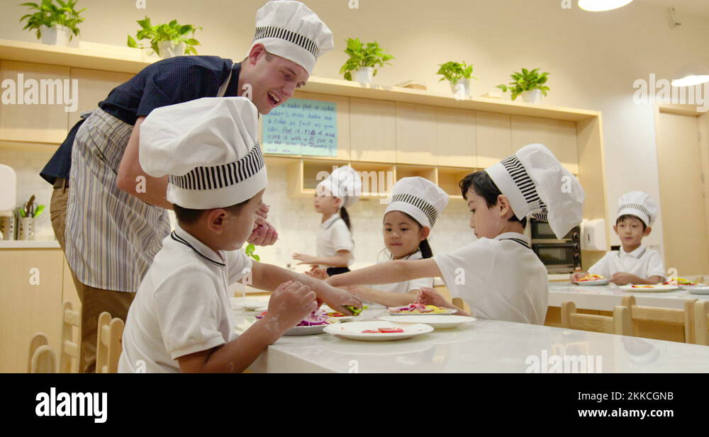 Children learning cooking in kindergarten classroom,4K Stock Video ...