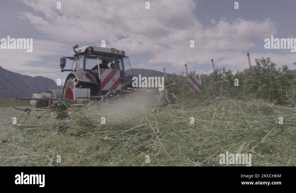 Tedder turning grass Stock Videos & Footage - HD and 4K Video Clips - Alamy