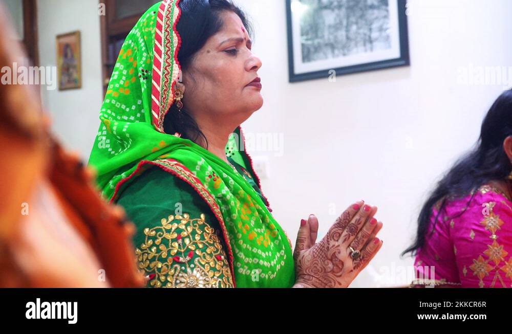 Indian Woman Clapping Hands In Devotion To God During Diwali Pooja ...