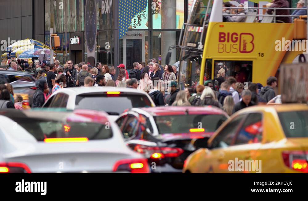 Busy Times Square, People walking and Traffic Jam in Midtown Stock ...