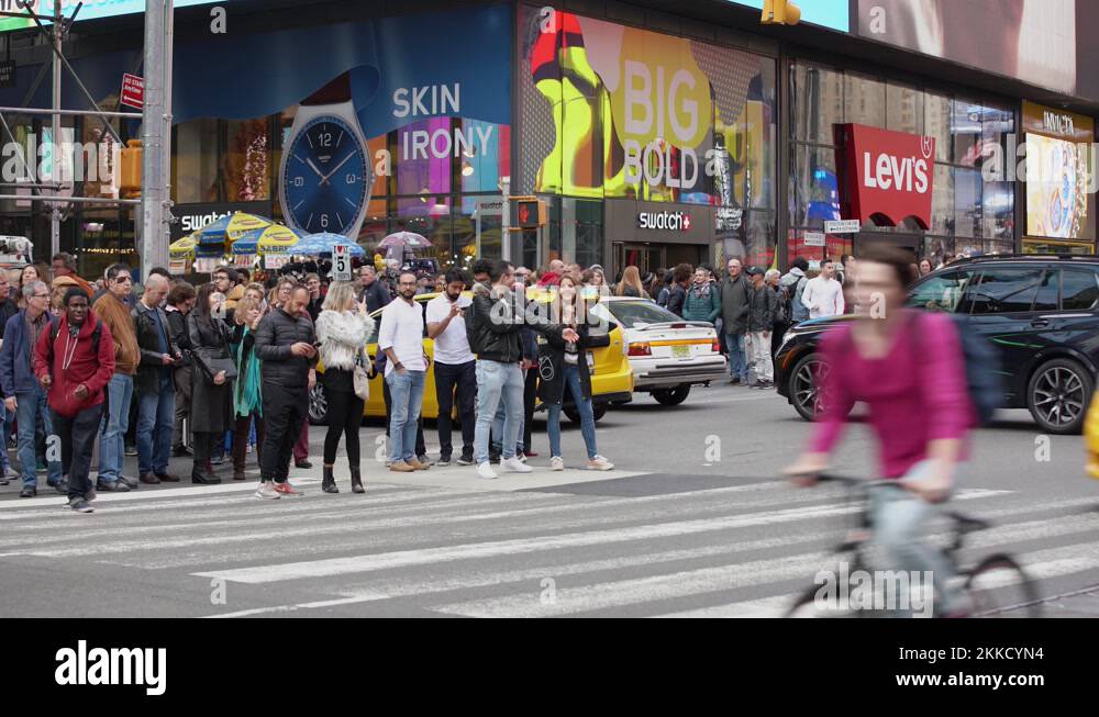 Busy Times Square, People walking and Traffic Jam in Midtown. Congested ...