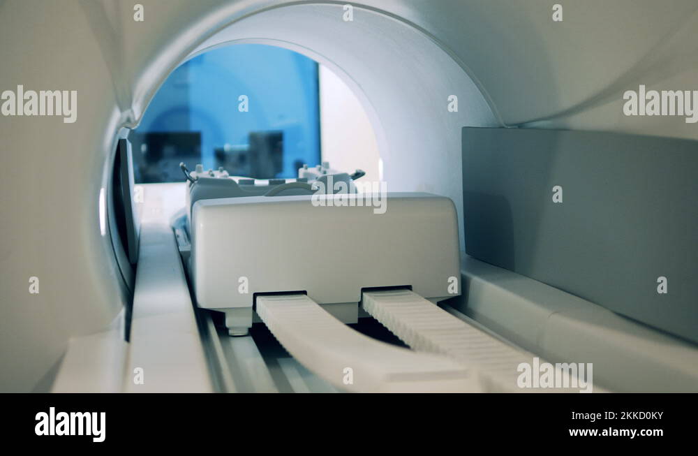Table of a CT scanner is moving inside of it Stock Video Footage - Alamy