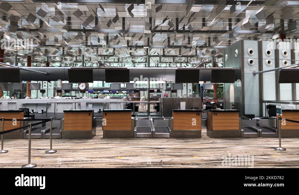 Singapore: Empty T3 departure hall with check-in counters at Changi ...