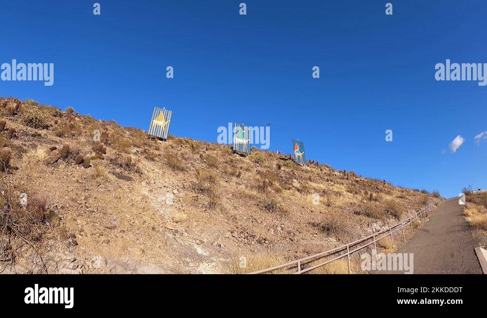 The three wise men sit on top of A mountain at the campus of Arizona ...