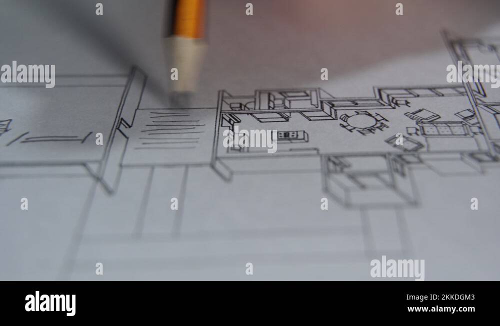 Architect draws a house plan, geometric shapes by pencil on sheet of ...