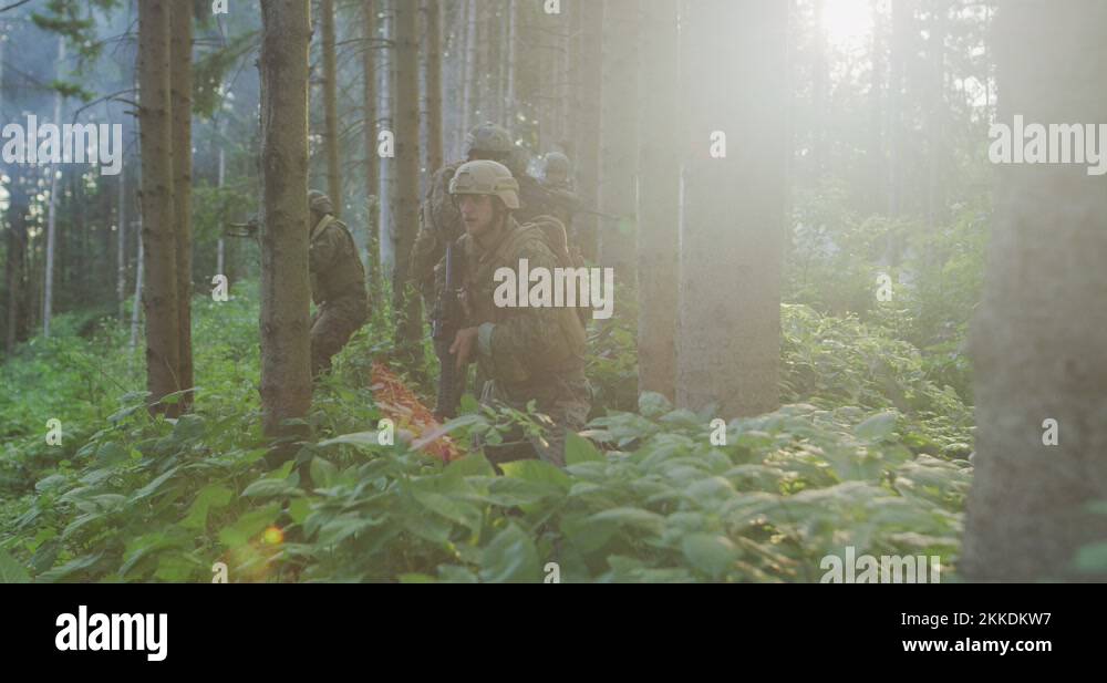 Millitary operation with gorup of soliders attacking enemy line in ...