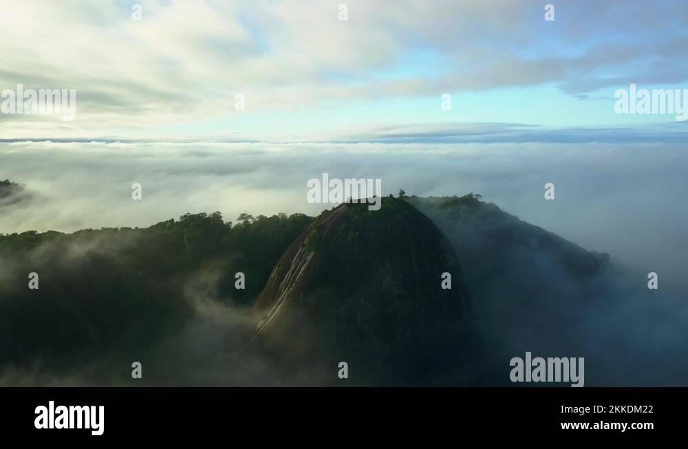 Voltzberg granite dome mountain in misty Suriname jungle rainforest ...