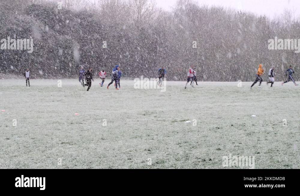 Playing football in the snow Stock Videos & Footage - HD and 4K Video ...