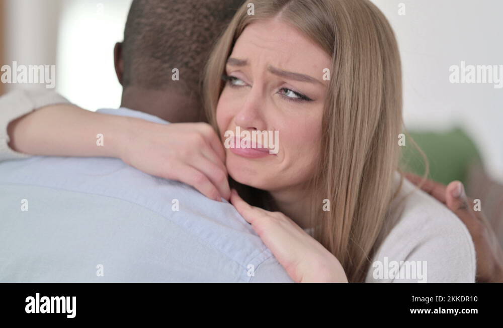 African Man Hugging and Consoling Crying Caucasian Partner Stock Video ...