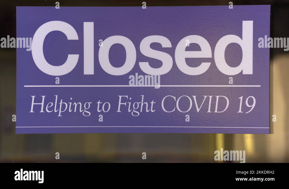 COVID 19 pandemic health safety signs on local businesses Stock Video ...