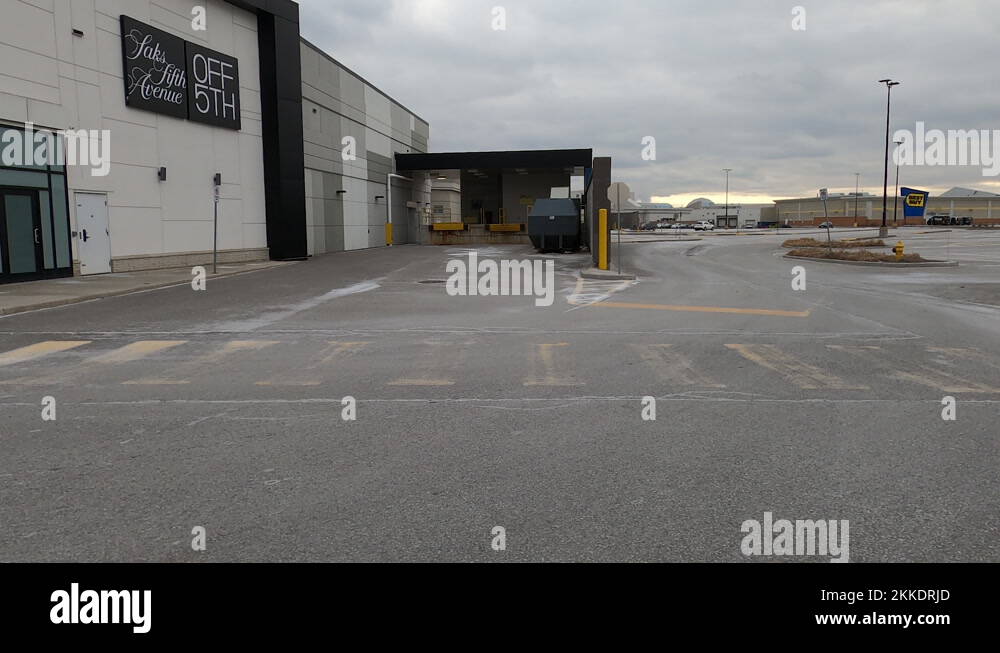 POV side view closed retail shopping mall in COVID 19 pandemic lockdown ...