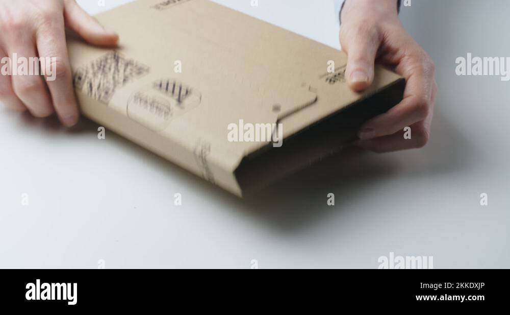 Open a parcel Stock Videos & Footage - HD and 4K Video Clips - Alamy