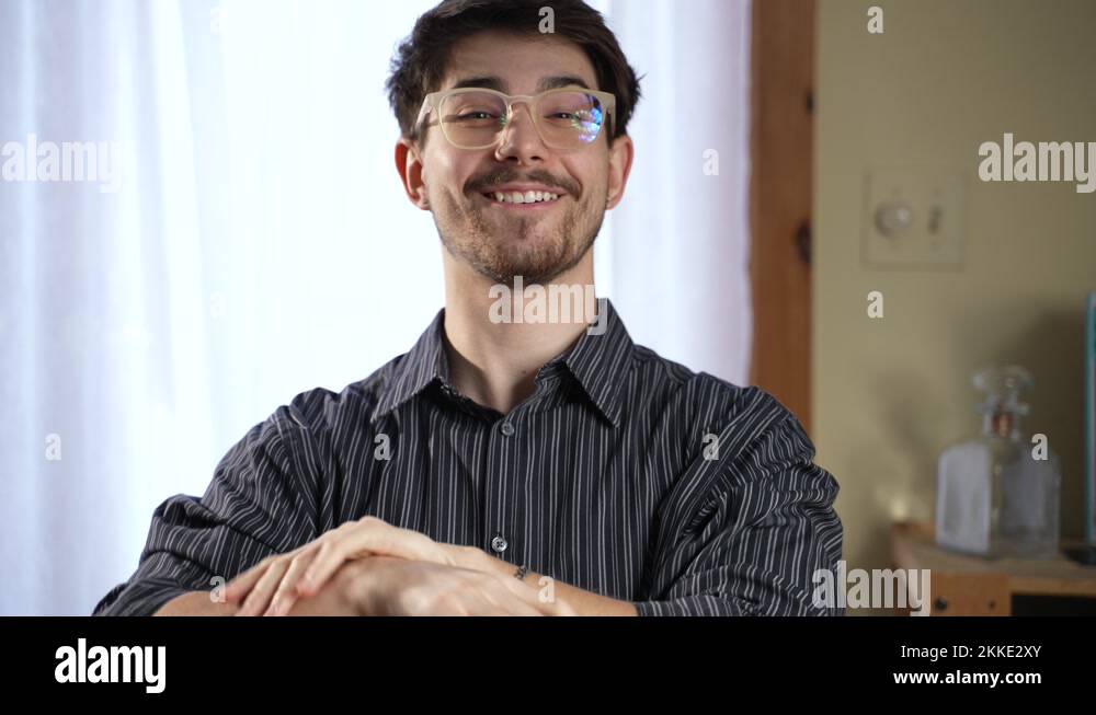 Closeup slow motion excited lucky young man wins big using personal ...