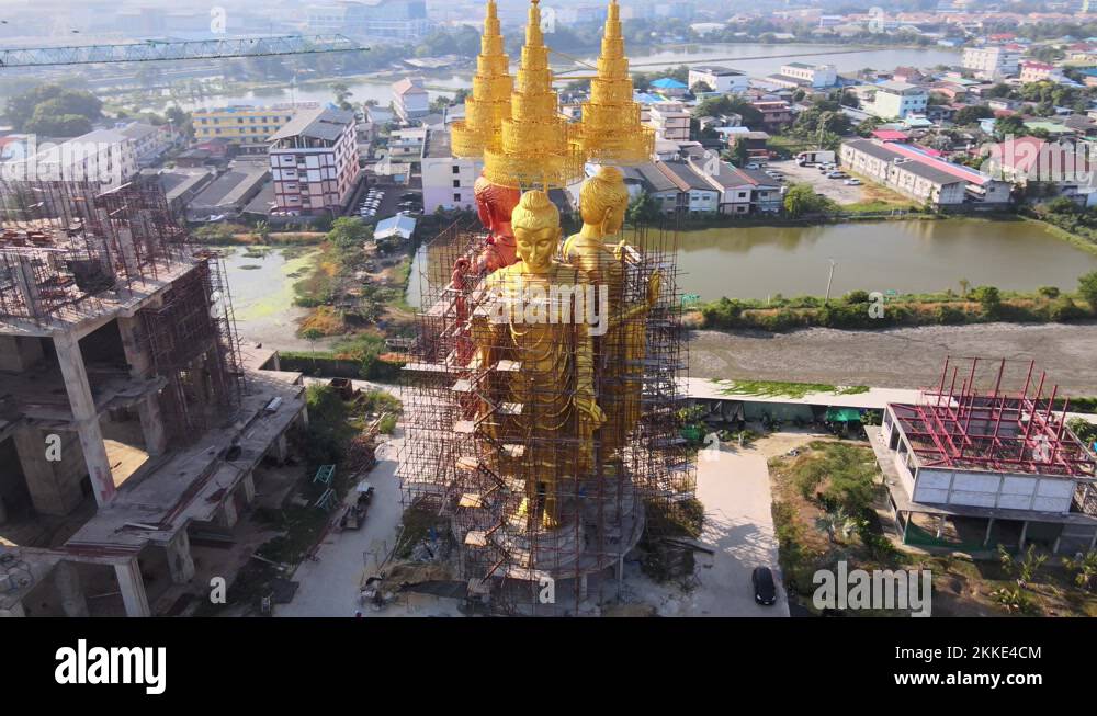4k Aerial Huge statue of three buddhist sculptures in The Ancient Siam ...