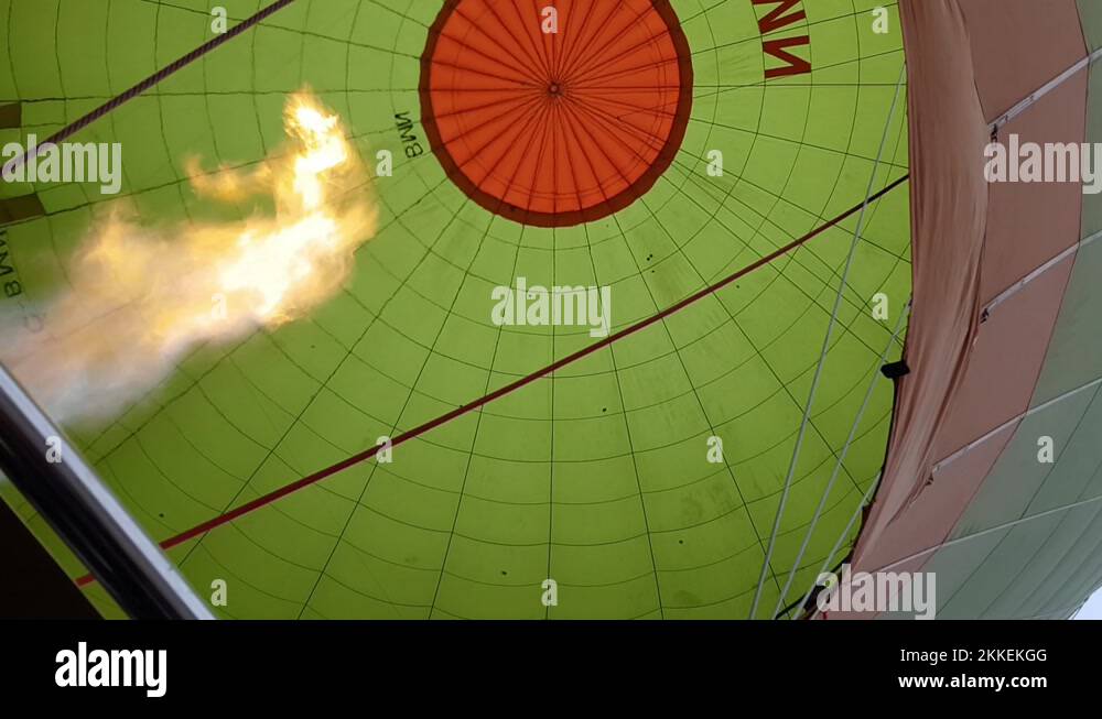 Blaze fire flaming from hot air balloon burner to inflate balloon dome ...