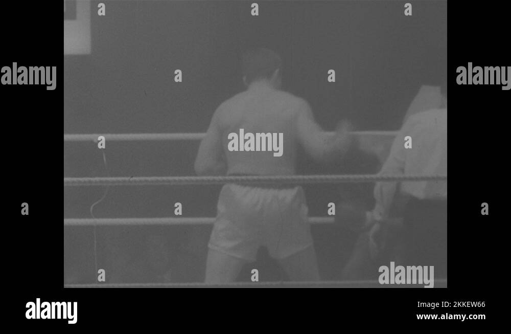 1960s: Title card. Men box. Referee halts match Stock Video Footage - Alamy