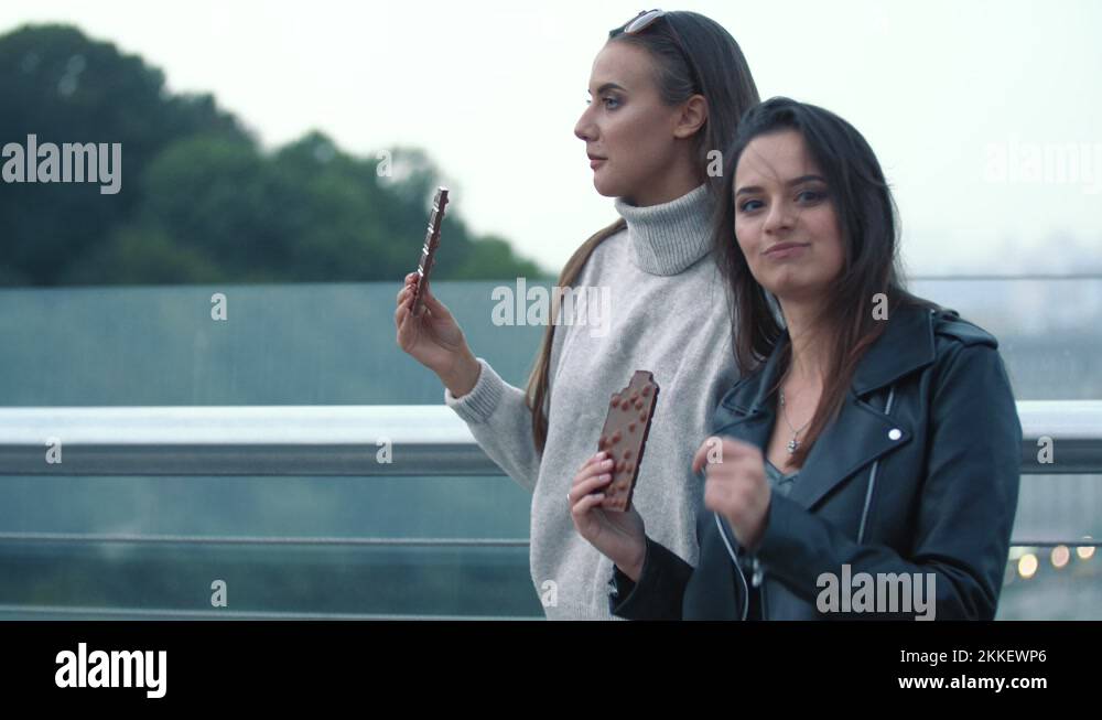 Girls eat chocolate Stock Videos & Footage - HD and 4K Video Clips - Alamy