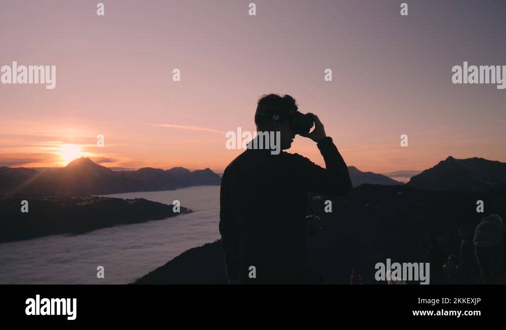 FPV Pilot Flying Drone In The Mountain During Golden Hour In Sunset ...