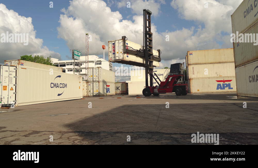 Shipping container lorry truck car lifting and loading by crane in ...