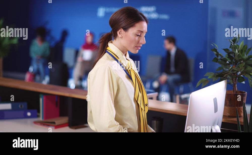 Beautiful Young Caucasian Woman Security Guard Using Personal Computer ...