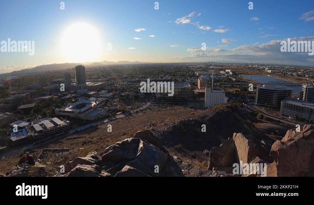 Pan across the developing downtown Tempe skyline to the Tempe Town Lake ...