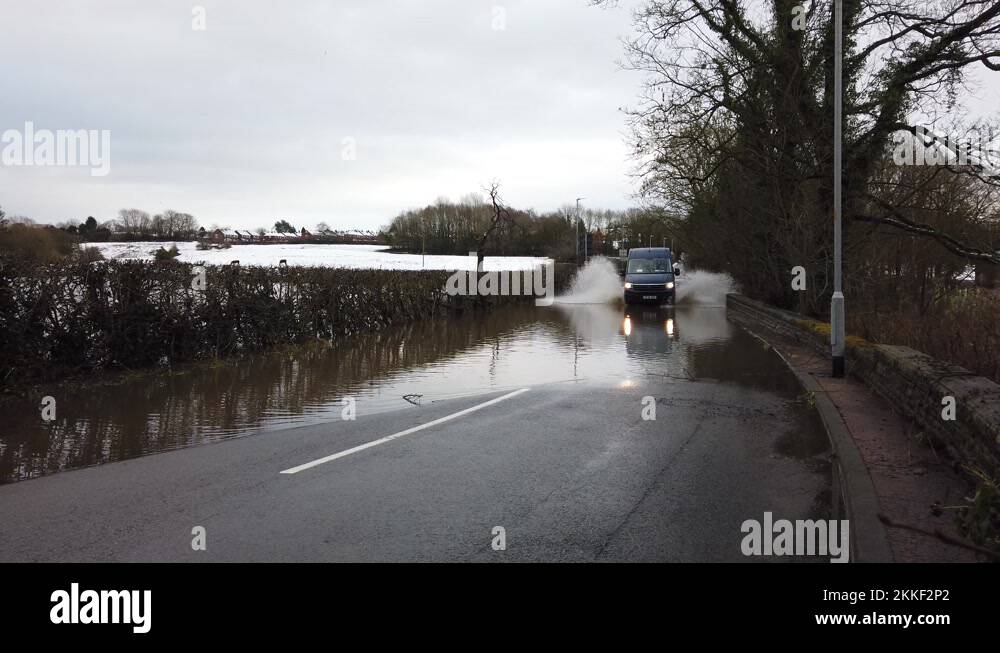 River Bollin in Wilmslow, Cheshire, England, UK after heavy rainfall ...