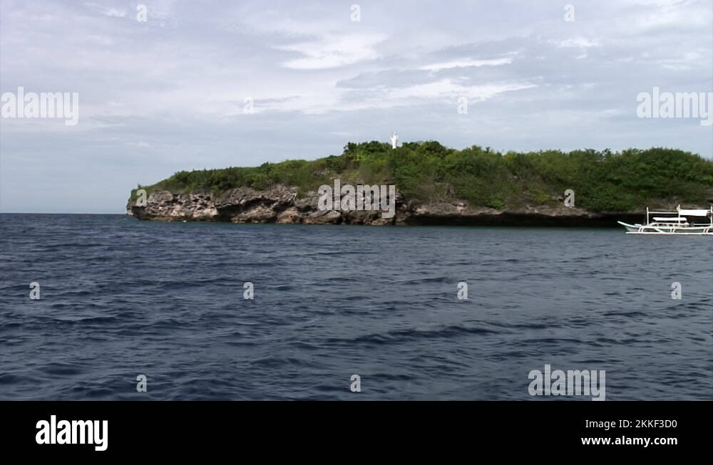 Philippine boat with bamboo wings on islands of Republic of Philippines ...